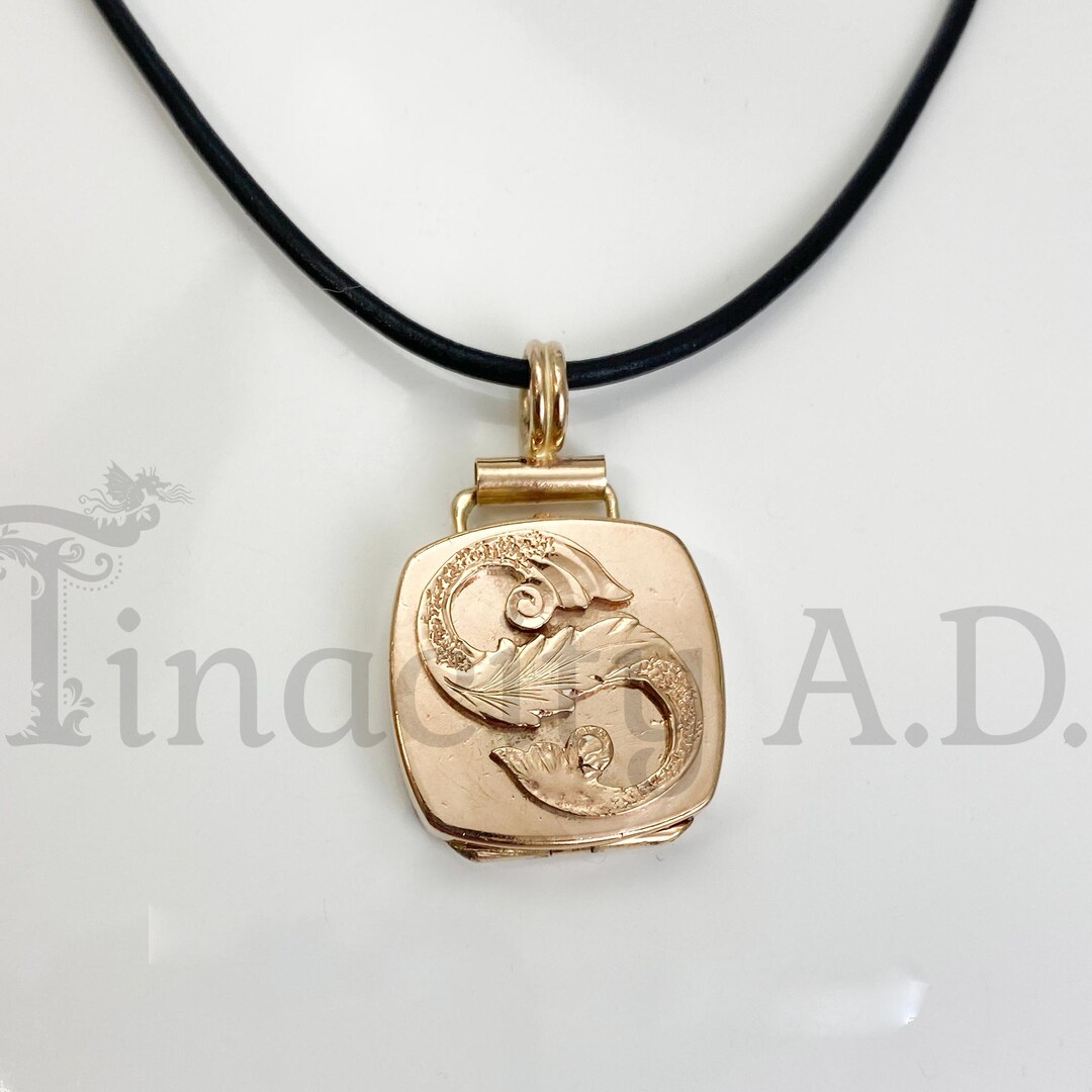 A Vintage Edwardian Cushion-shaped Locket-fob With Fancy Engraved s ...