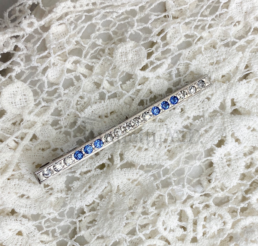 A Vintage Art Deco Sterling Silver Bar Pin Featuring Vivid Sapphire ...