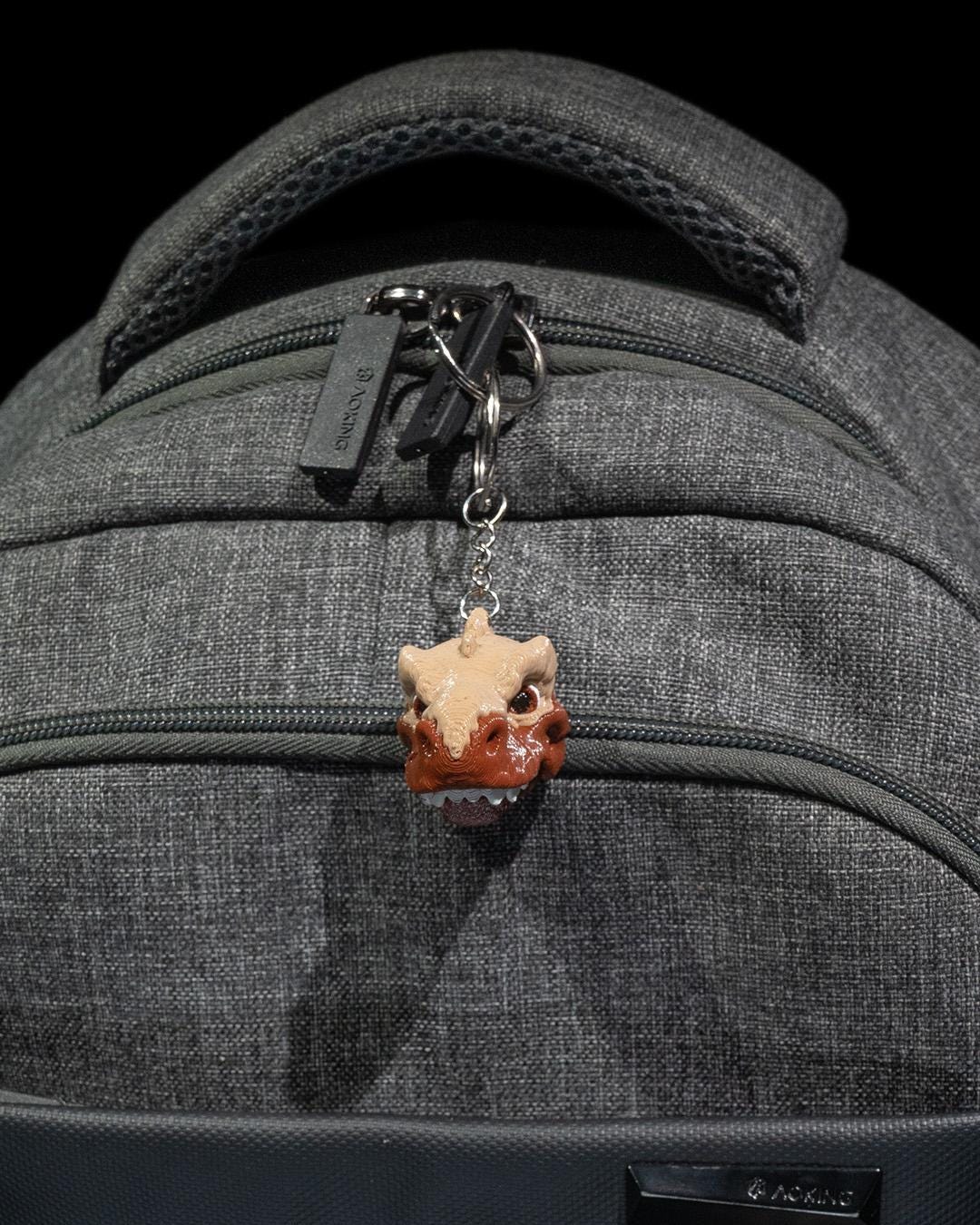 Articulated T-rex Keychain Rule the Jurassic With a Mini King of ...