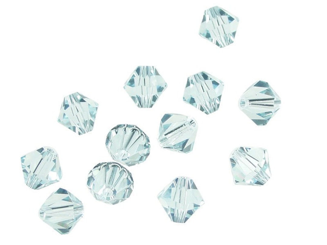 12 LIGHT AZORE 6mm Bicones Light Azore Blue Swarovski Bicones Austrian ...