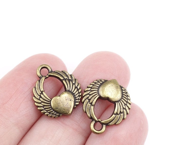 Antique Brass Charms Brass Heart Charms Tierracast WINGED - Etsy