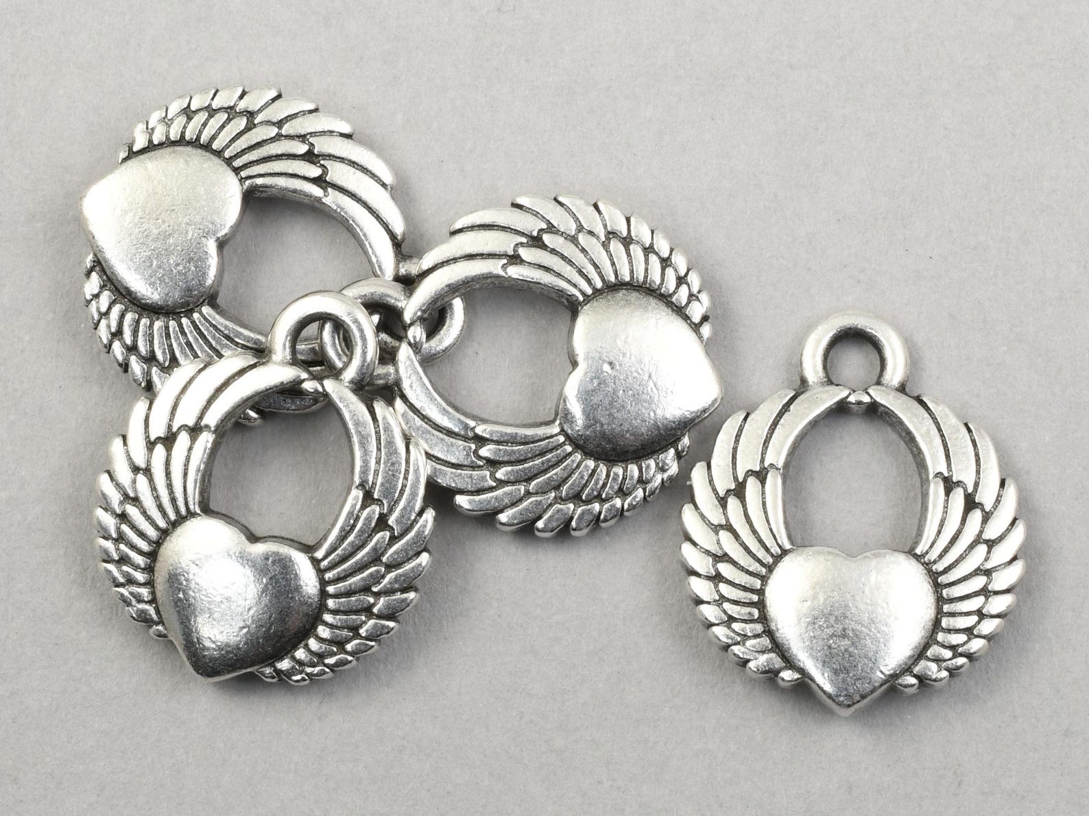 Winged Heart Charms - Antique Silver Charms - Heart Pendants Tierracast ...