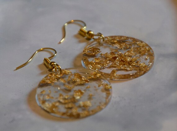 Gold resin earrings store