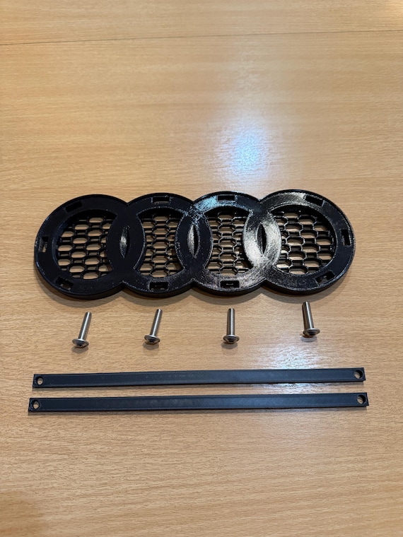 Audi honeycomb badge holder store