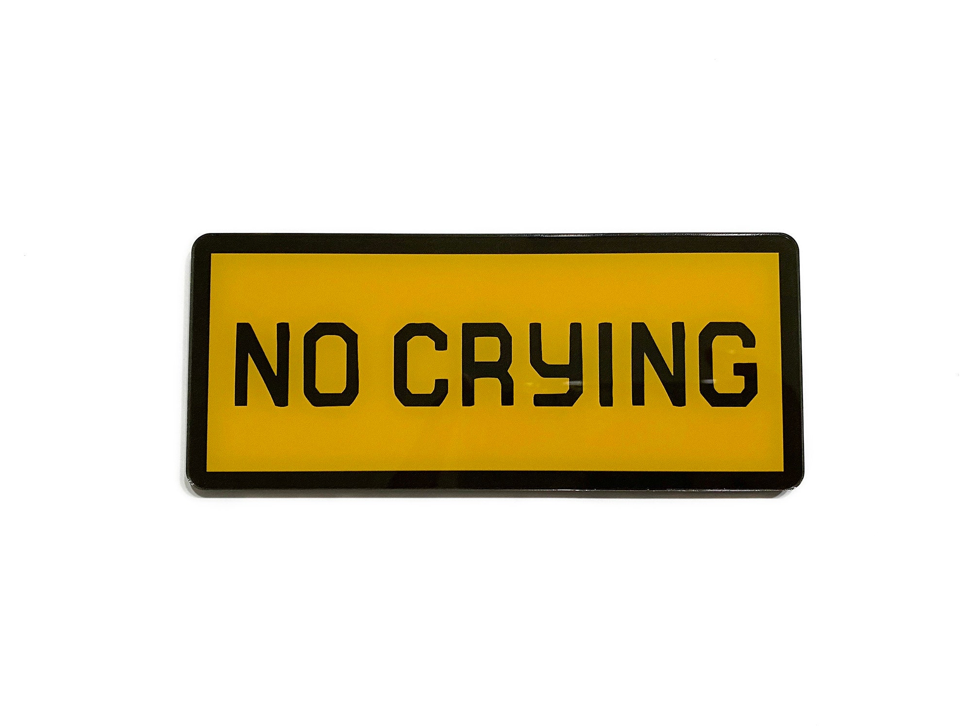 No Crying Sign