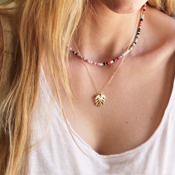 Beaded necklace with pendant store