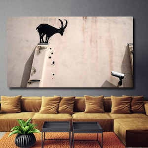 Banksy's Mysterious Goat Canvas Wall Art, Bansy Goat Perched on the ...
