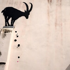 Banksy's Mysterious Goat Canvas Wall Art, Bansy Goat Perched on the ...