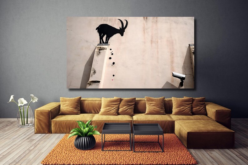Banksy's Mysterious Goat Canvas Wall Art, Bansy Goat Perched on the ...
