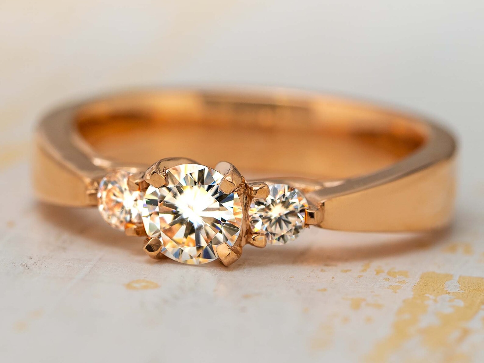 Three Stone Engagement Ring in Rose Gold With Floral Prongs - Etsy