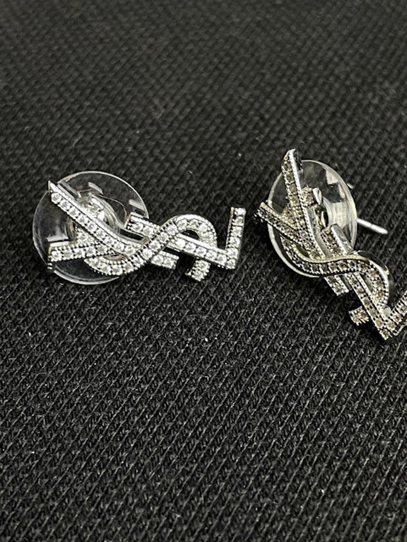 Fashionable Yves Saint Laurent YSL Logo Silver Plated Vintage Stud ...