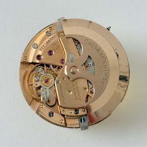 Omega Cal 560 Watch Parts Movement Calendar Disk Fork Wheels Springs ...