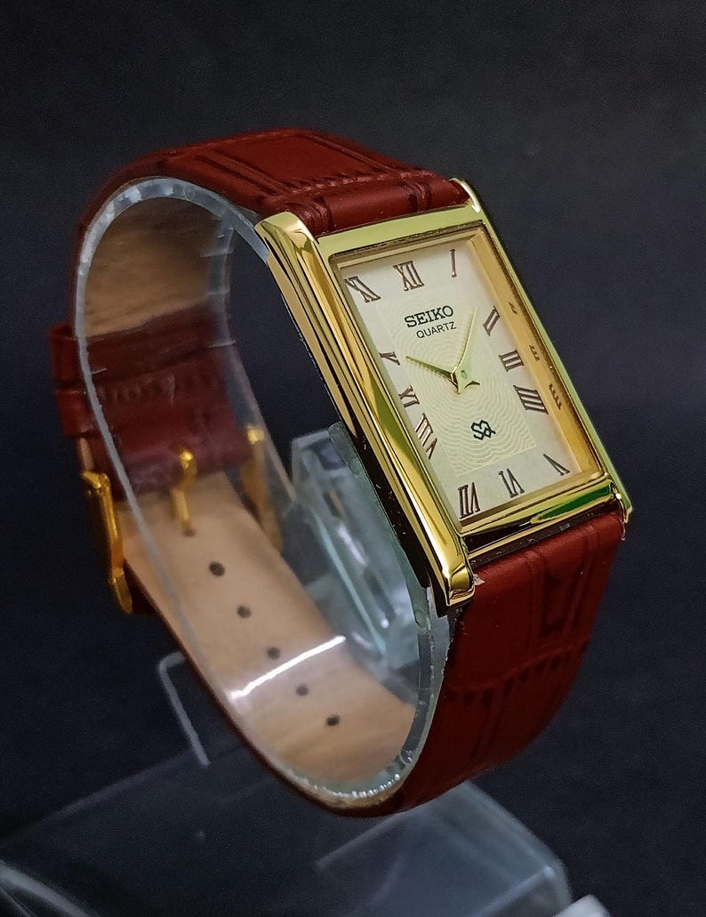 Vintage Seiko Tank Quartz Japanese Slim Roman Golden Dial 27mm ...