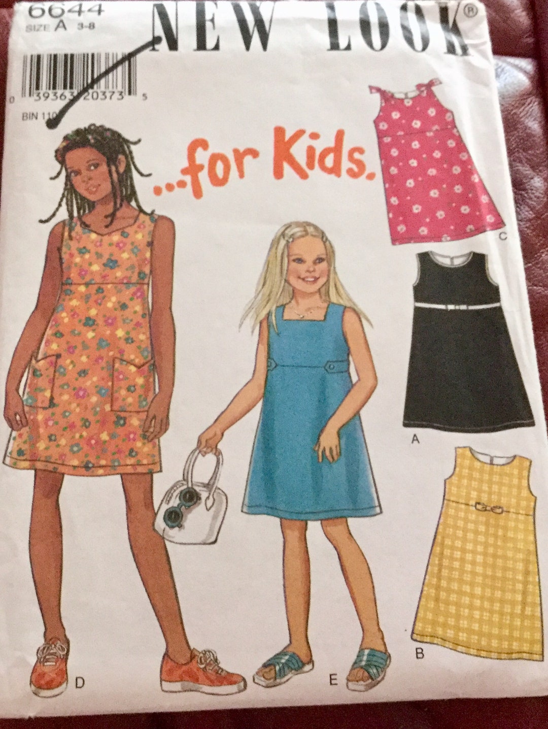New Look 6644 | Girls Sleeveless Dress Pattern With Neck Variations ...