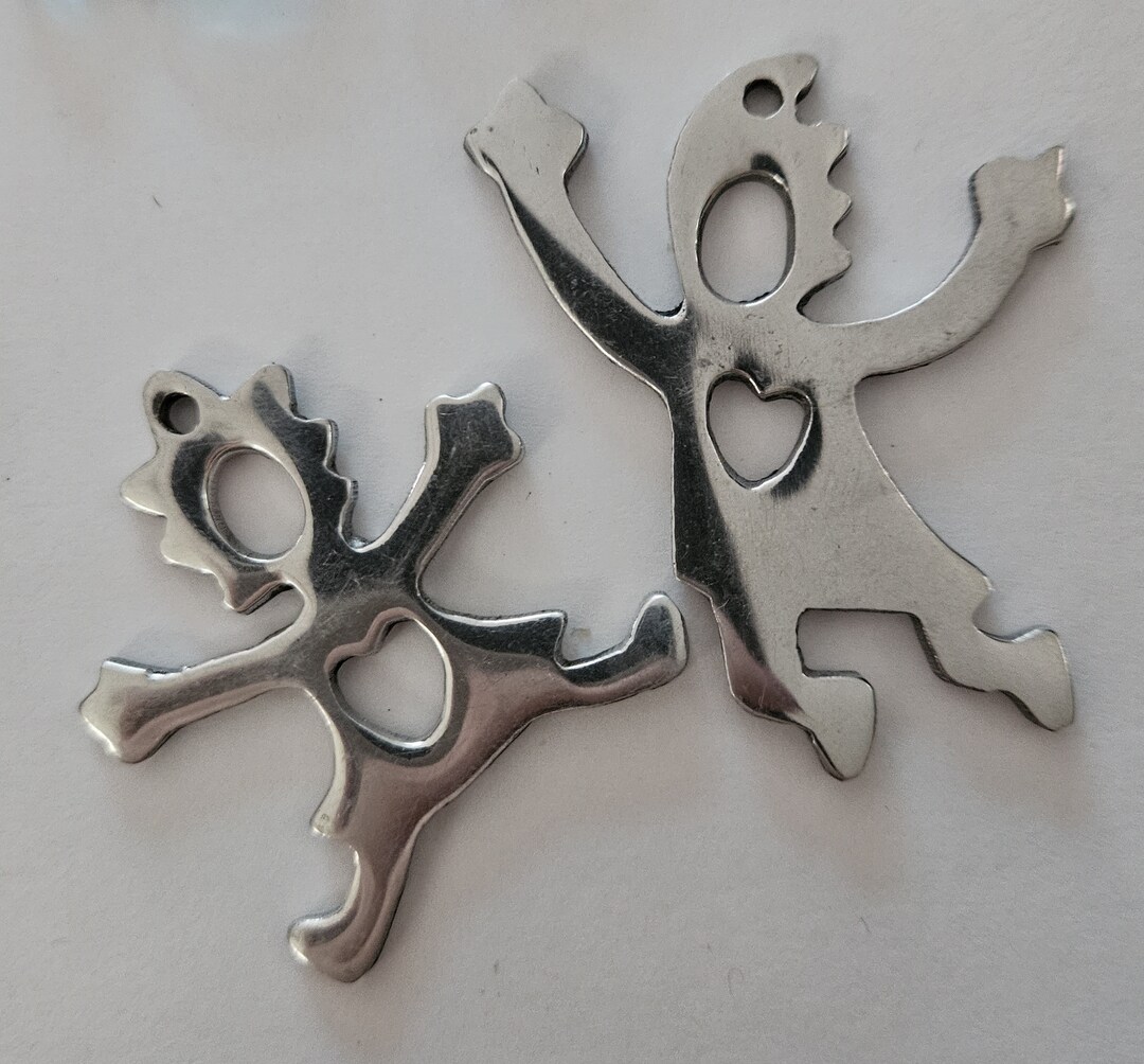 Two Aluminum Character Pendants. - Etsy