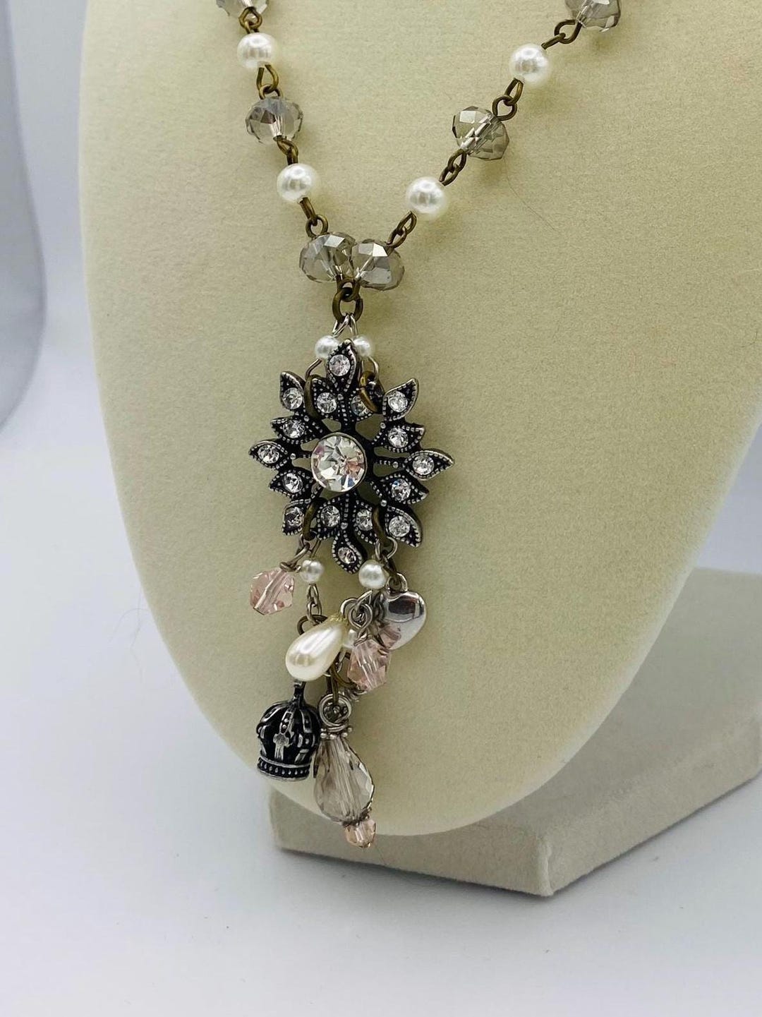 A Gilded Life Charm Necklace With Rhinestones, Pink and Grey Beads and ...