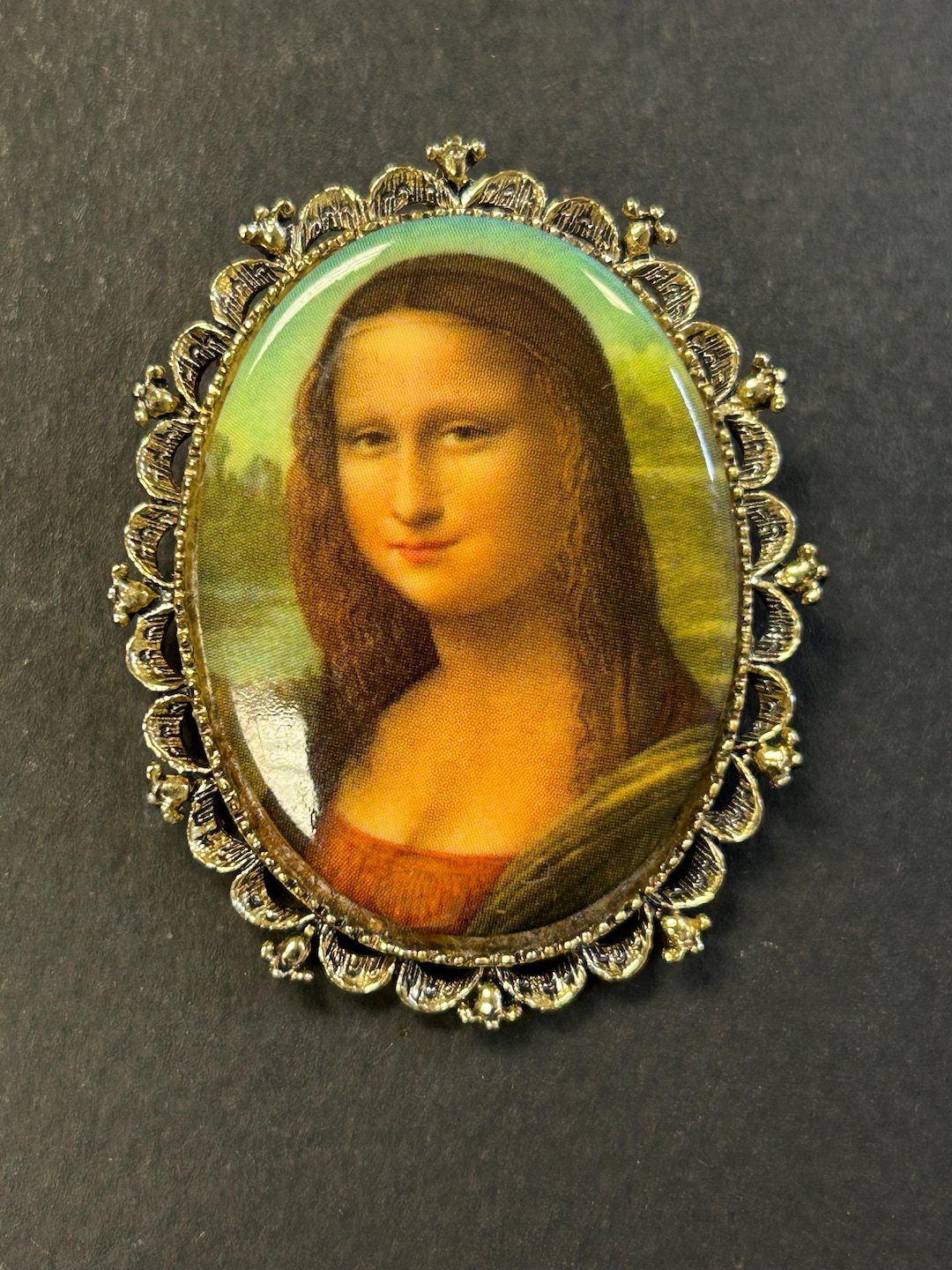 Vintage Gerrys Mona Lisa Brooch - Etsy