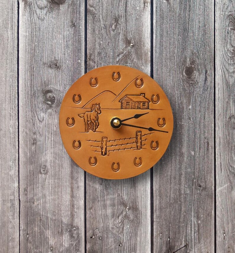 Leather Clock With a Ranch Scene Tooled Into the Leather, Showing a ...