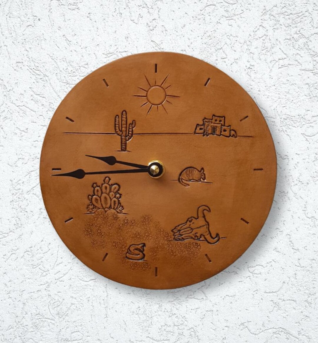 Leather Wall Clock With a Desert Scene Tooled Into Leather Showing the ...