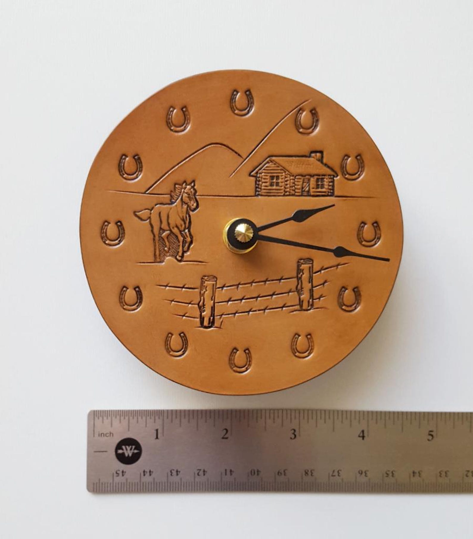 Leather Clock With a Ranch Scene Tooled Into the Leather, Showing a ...