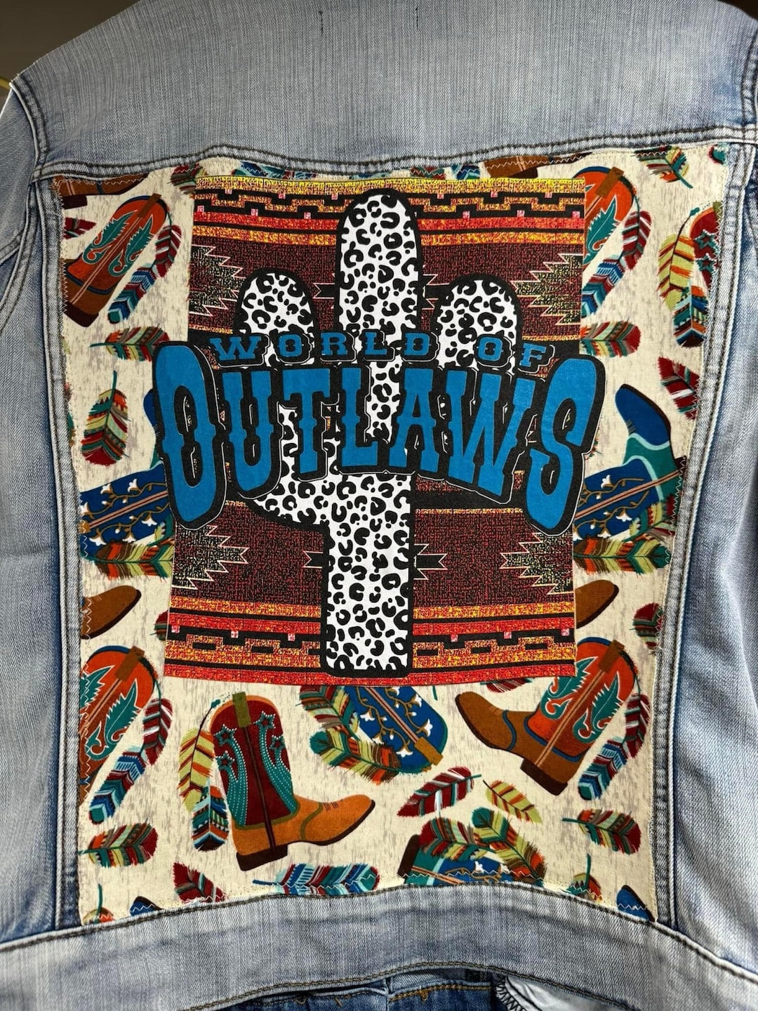 Denim Jacket, With Cowboy Boots, and World of Outlaws on the Back ...