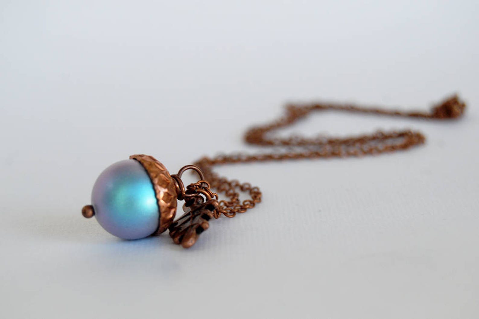 Tide Pool Magic Acorn Necklace | Iridescent Light Blue and Copper Acorn ...