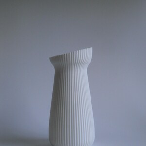 The Flair Vase: Features Elegant Ridges and a Unique Flared Top ...