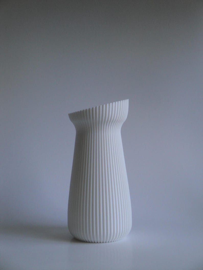 The Flair Vase: Features Elegant Ridges and a Unique Flared Top ...