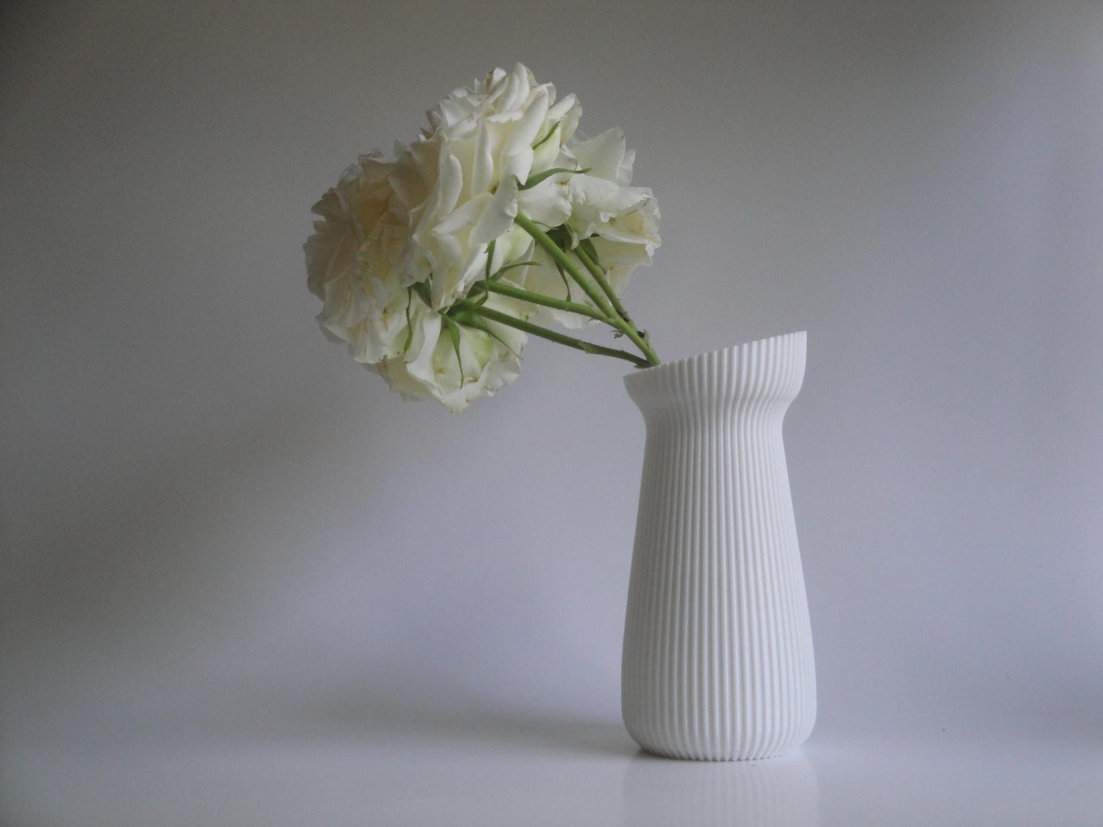 The Flair Vase: Features Elegant Ridges and a Unique Flared Top ...