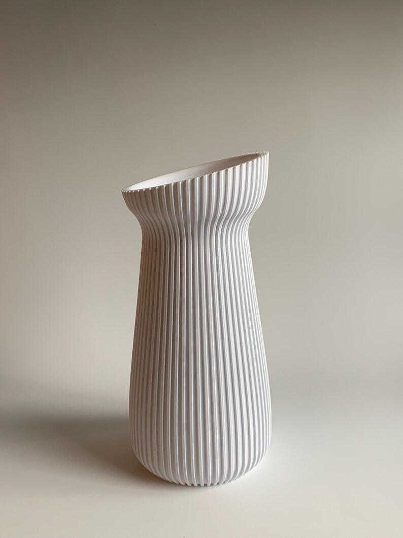 The Flair Vase: Features Elegant Ridges and a Unique Flared Top ...