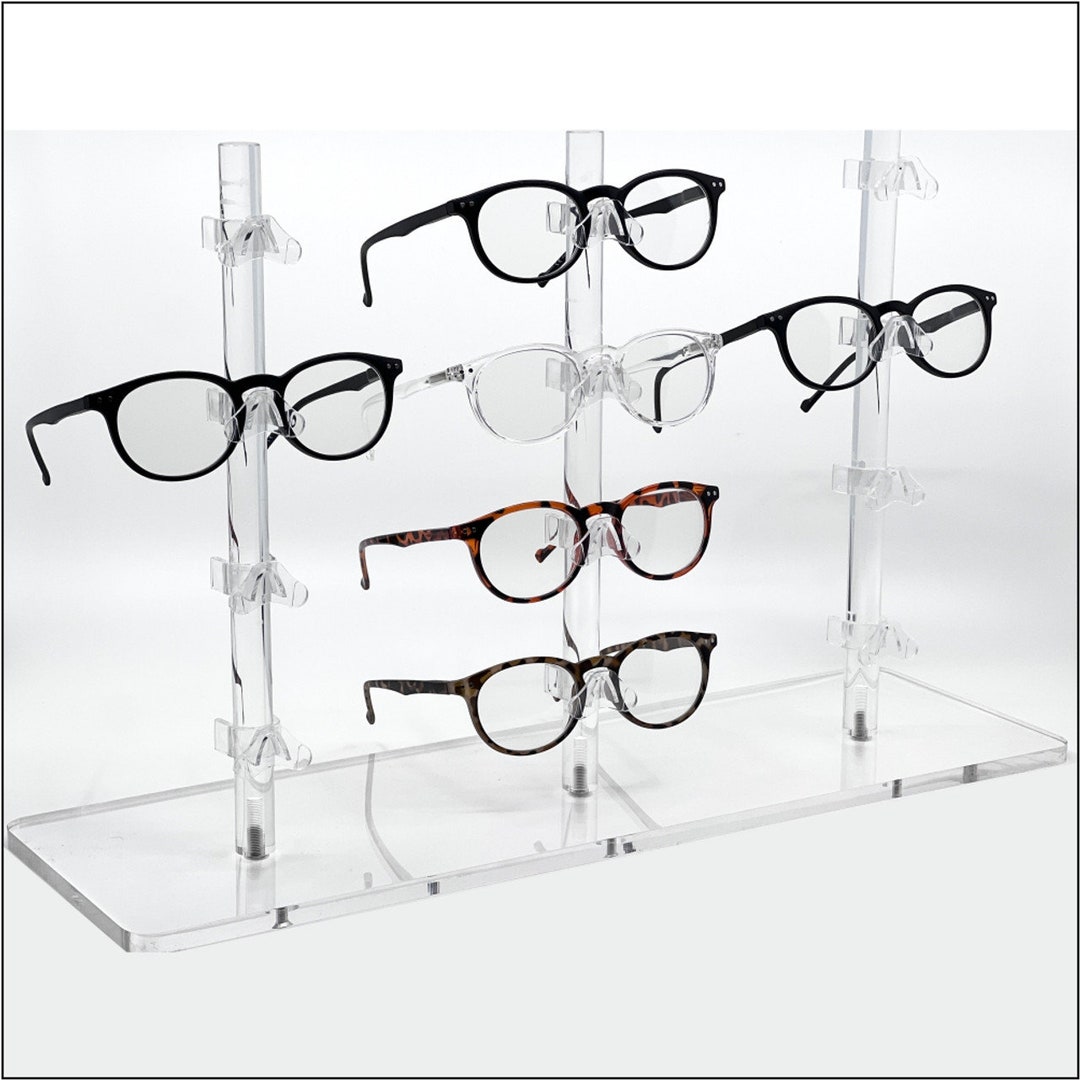 Triple Optical Frame Display Risers With 3x4 Triangular Clips in a Row ...