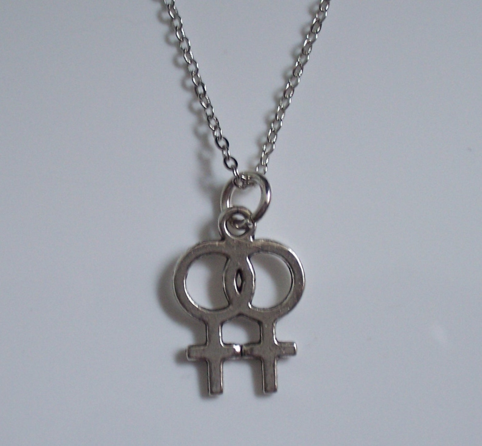 Silvertone Fused Double Venus Symbol Necklace and Earrings Set ...