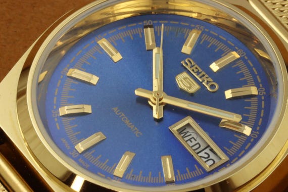 Vintage refurbished Seiko 5 golden blue dial men's wo… - Gem