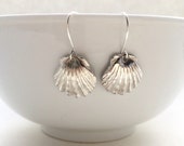 Items similar to Sunrise Shell Earrings on Etsy