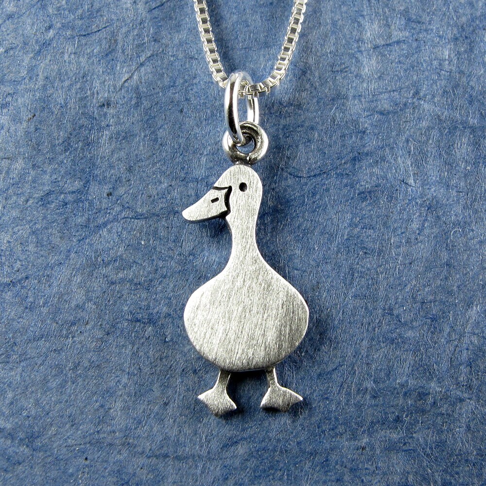 Tiny duck necklace / pendant | Etsy