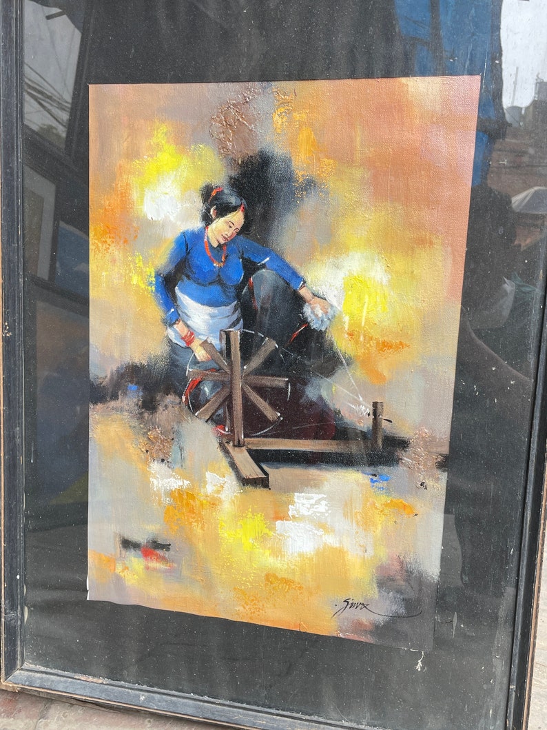 Traditional Women Using Wheeling Machine charkha for Transforming ...