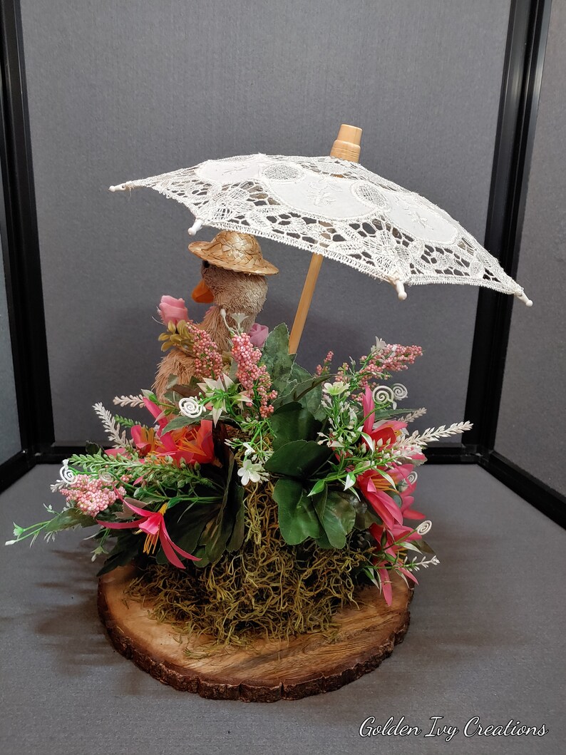 Pink Floral Duck Table Décor With Greenery, Moss, and Lacy Umbrella on ...