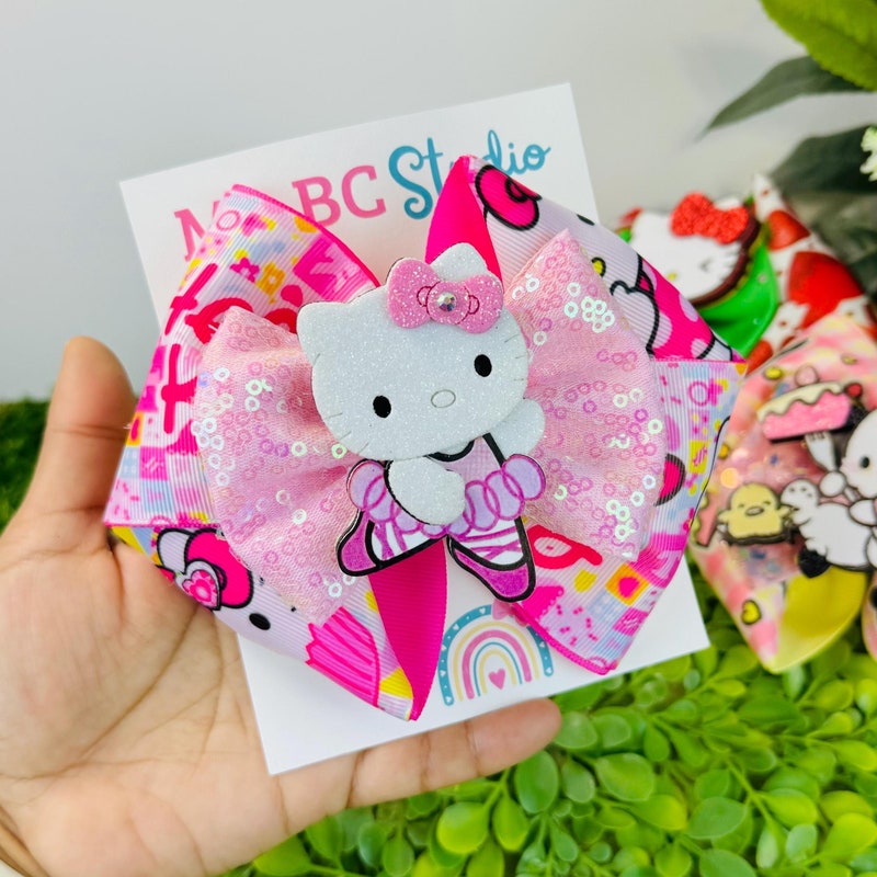 Hello kitty bow - Etsy