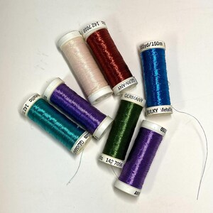 Collection of Seven Spools of Sulky Metallic Thread in Various Colors ...