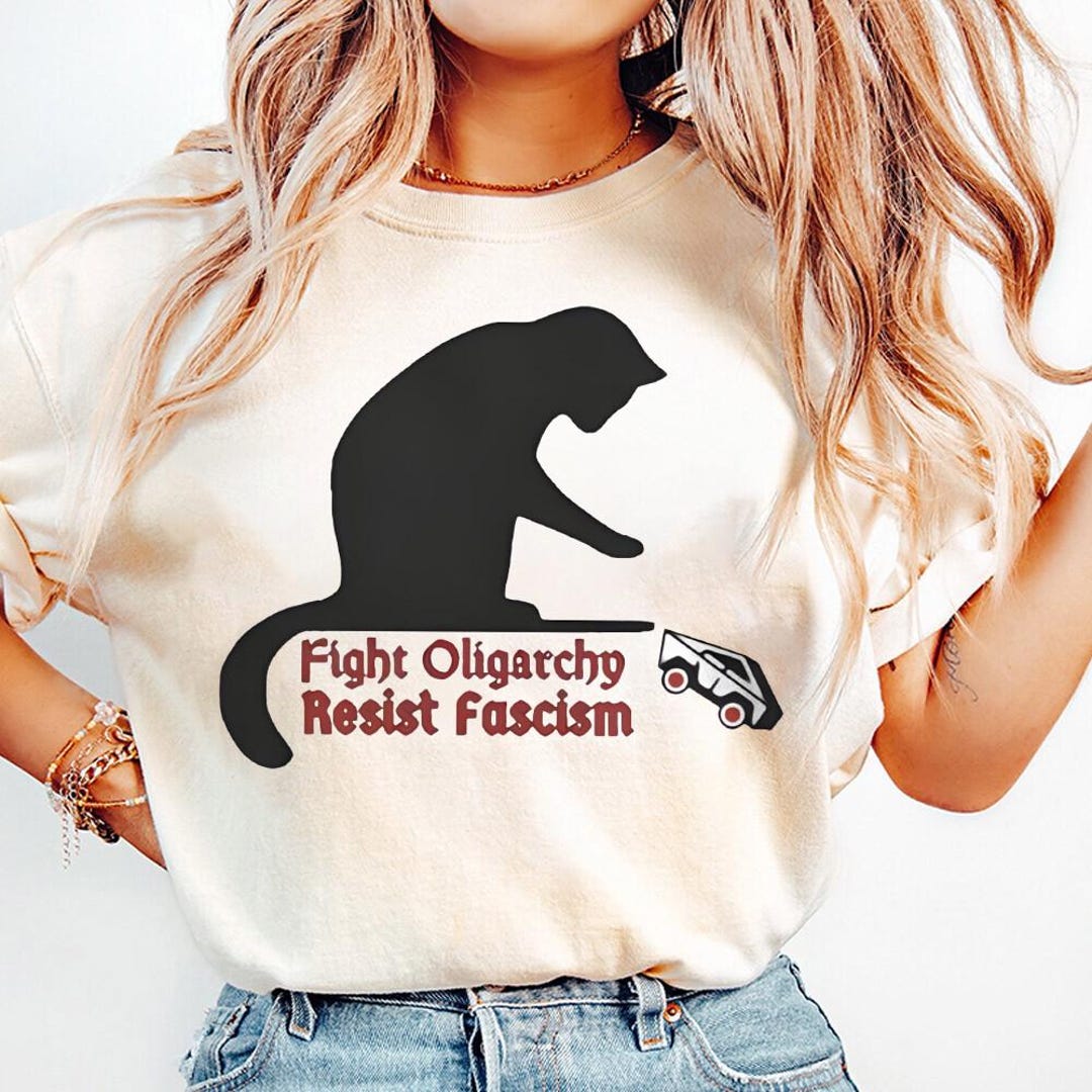 Cat Pushing Tesla Cybertruck Resist Fascism Fight Oligarchy Shirt ...