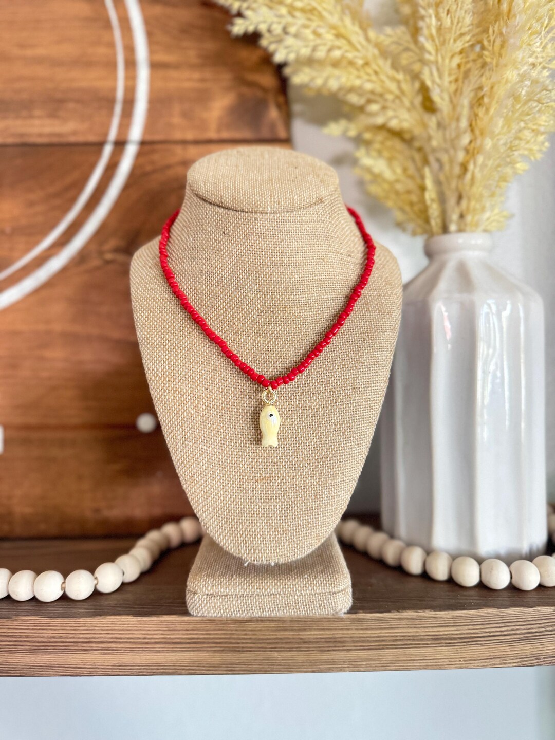 The Lure Necklace – Red Glass Bead Necklace With White Fish Charm ...