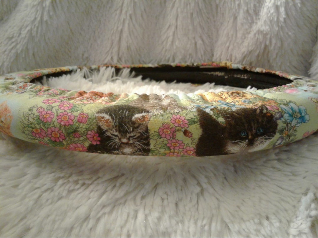 Limited Supply Available! Adorable Kittens in the Garden Steering Wheel ...