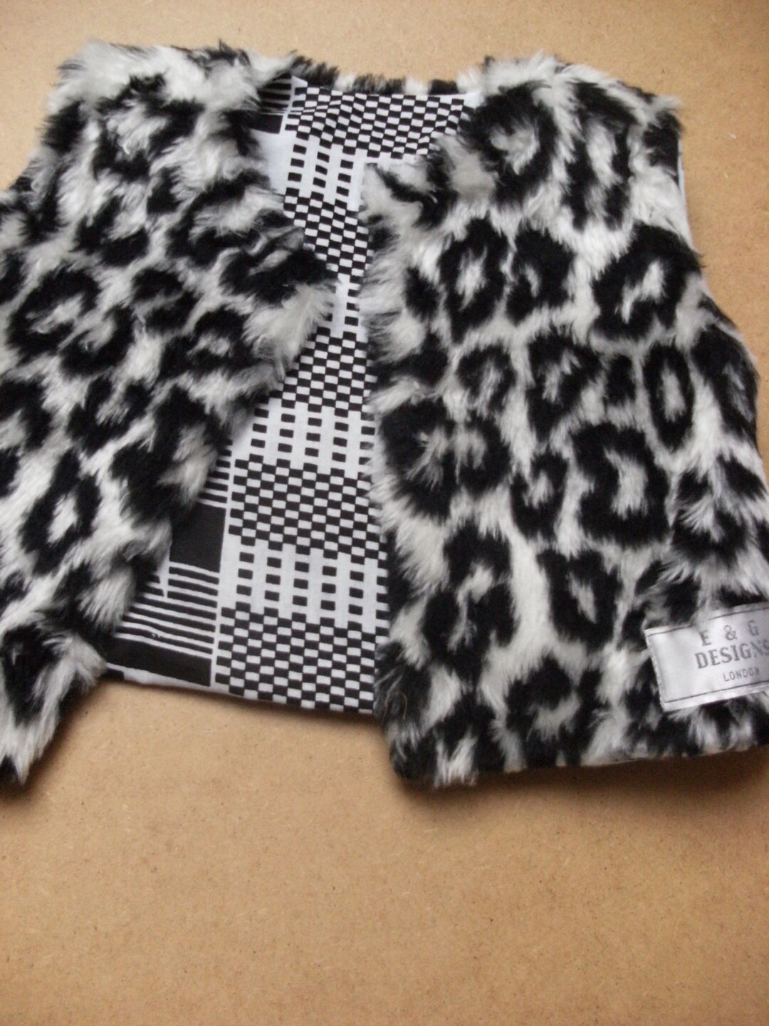 Reversible Snow Leopard Faux Fur Body Warmer Lined With Kente Print, 18 ...