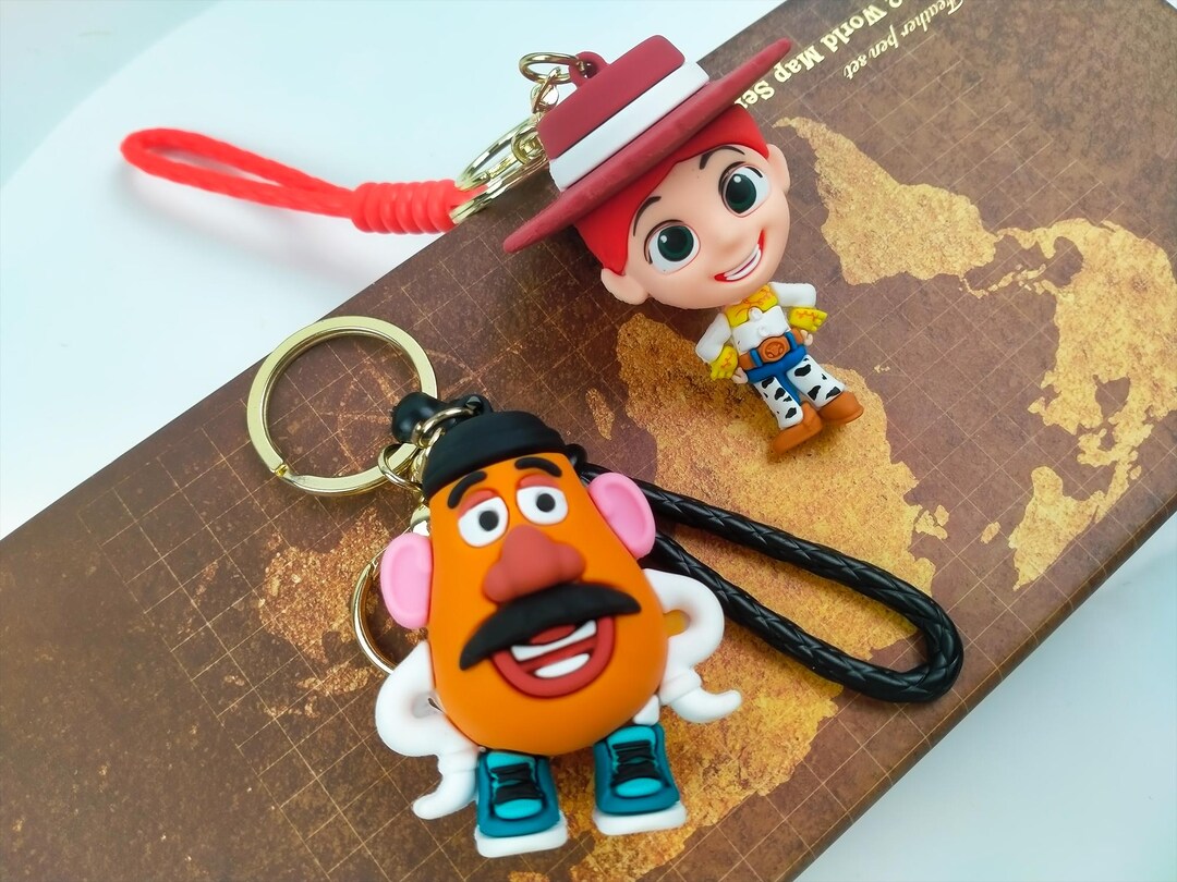 Toy Story Keychain in a Sea of Books Cartoon Character Keychain Toy ...