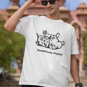 Cute Cat T-shirt Playful Rolling Kitty Minimalist Line Art Graphic ...