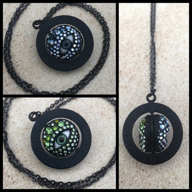 Eye Talisman Spinner Pendant Necklace - Black With Green and Blue Eyes ...