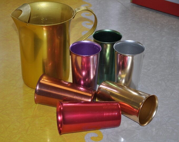 Vintage Kromex Pitcher and Six Assorted Colored Tumblers Plus One Extra ...