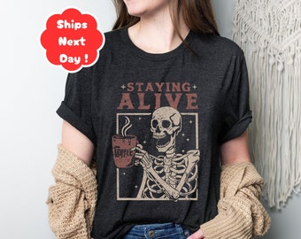 Staying Alive Skeleton Shirt: Funny Coffee Lover's Retro Halloween Tee ...