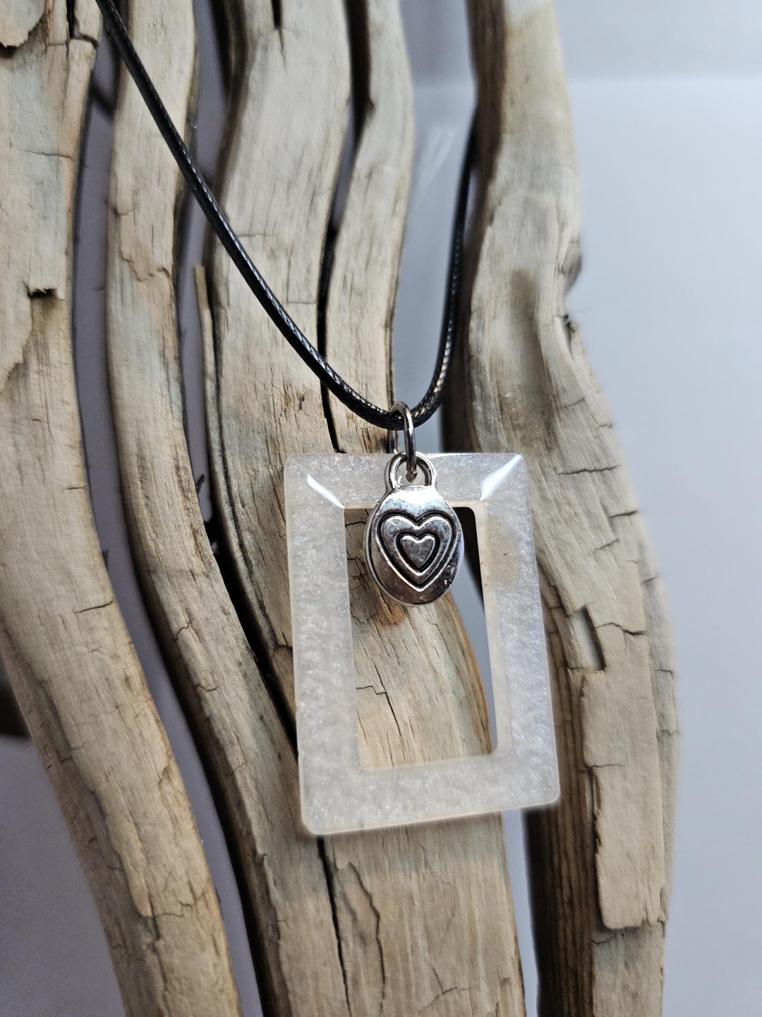 Pearl Mica Powder in Resin, Frameless Rectangular Pendant, on a Black ...