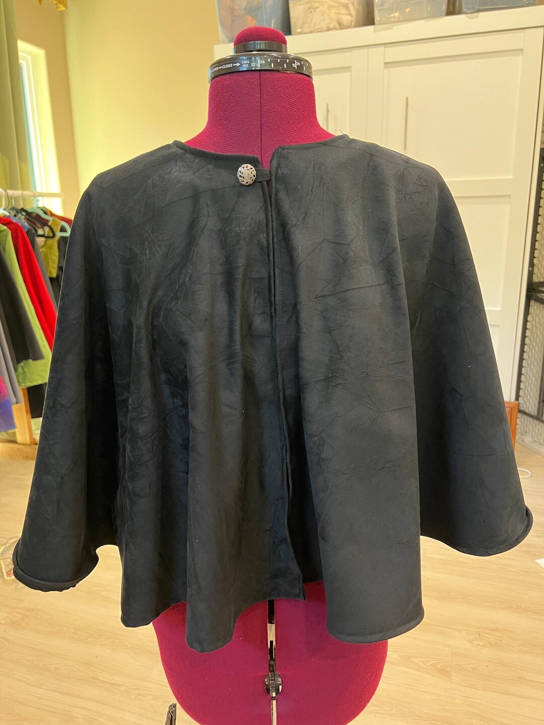 Black Faux Suede Capelet, Metal Button and Loop Closure. 16.5. No Hood ...